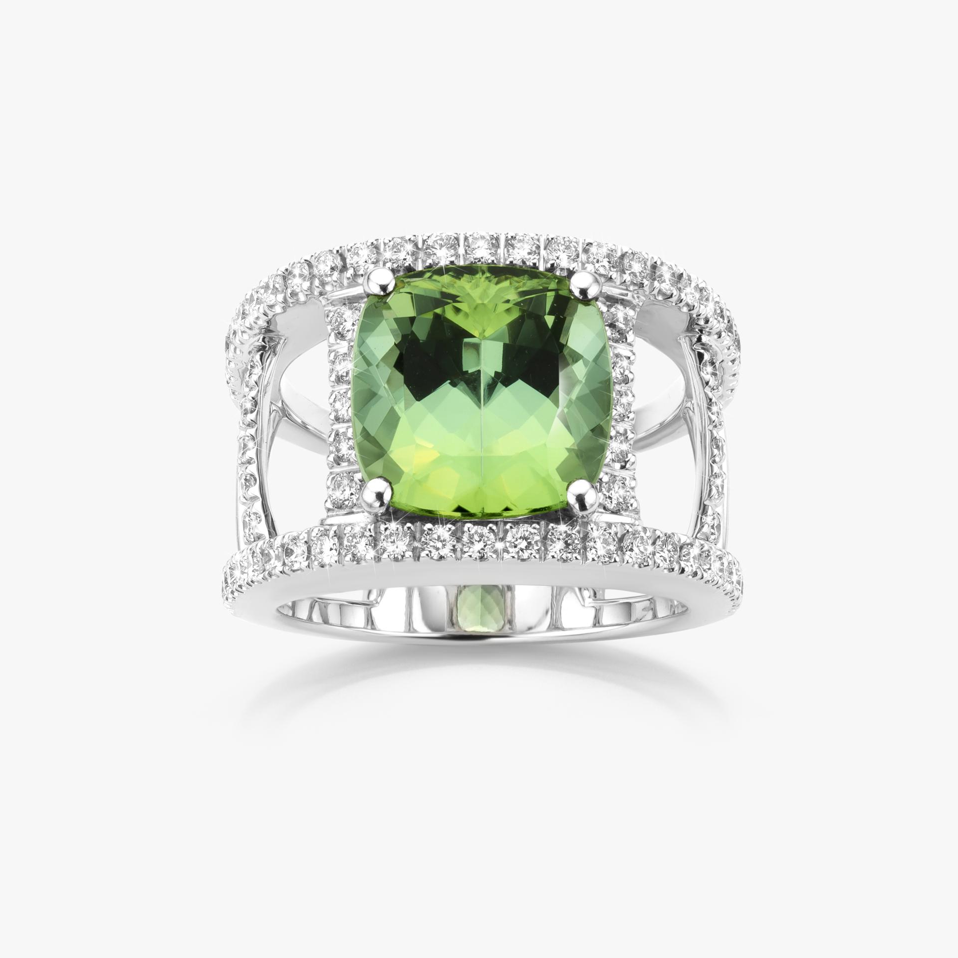 White gold ring set with a green tourmaline and brilliant cut diamonds ...